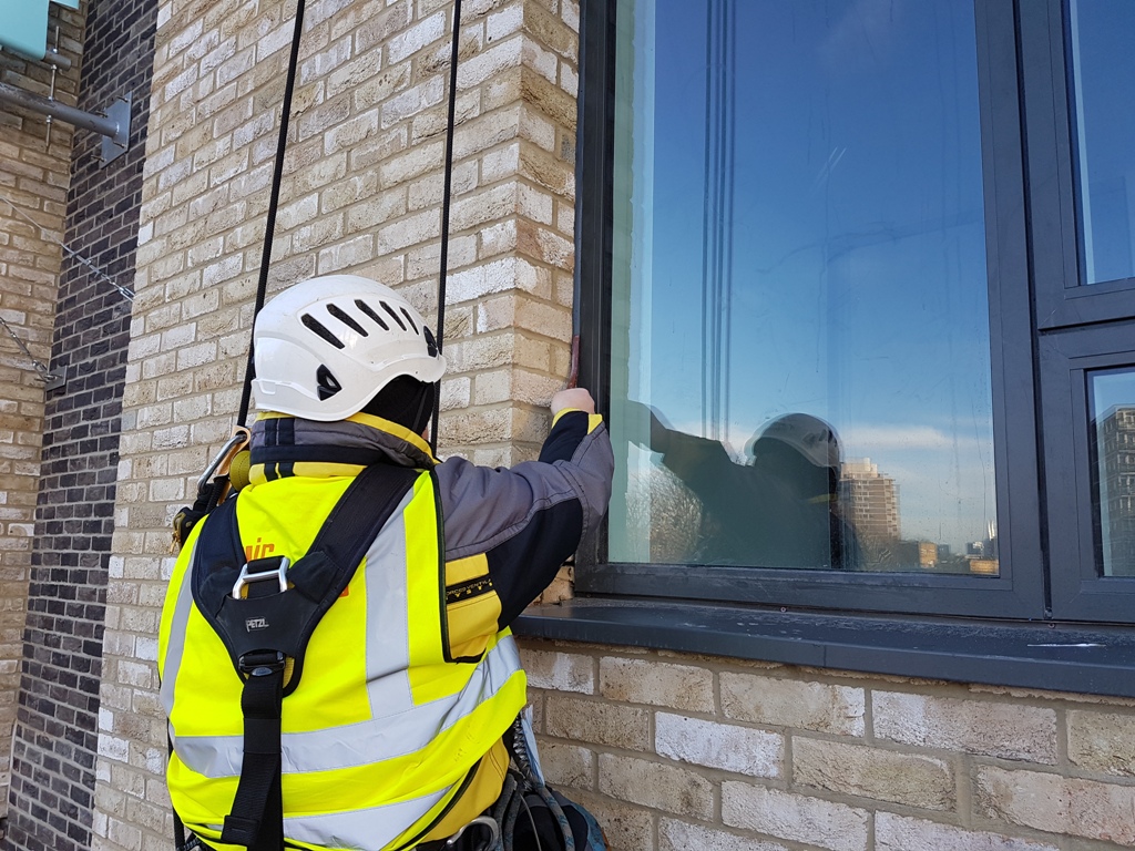 Rope access mastic application - Repair Abseiling Ltd.