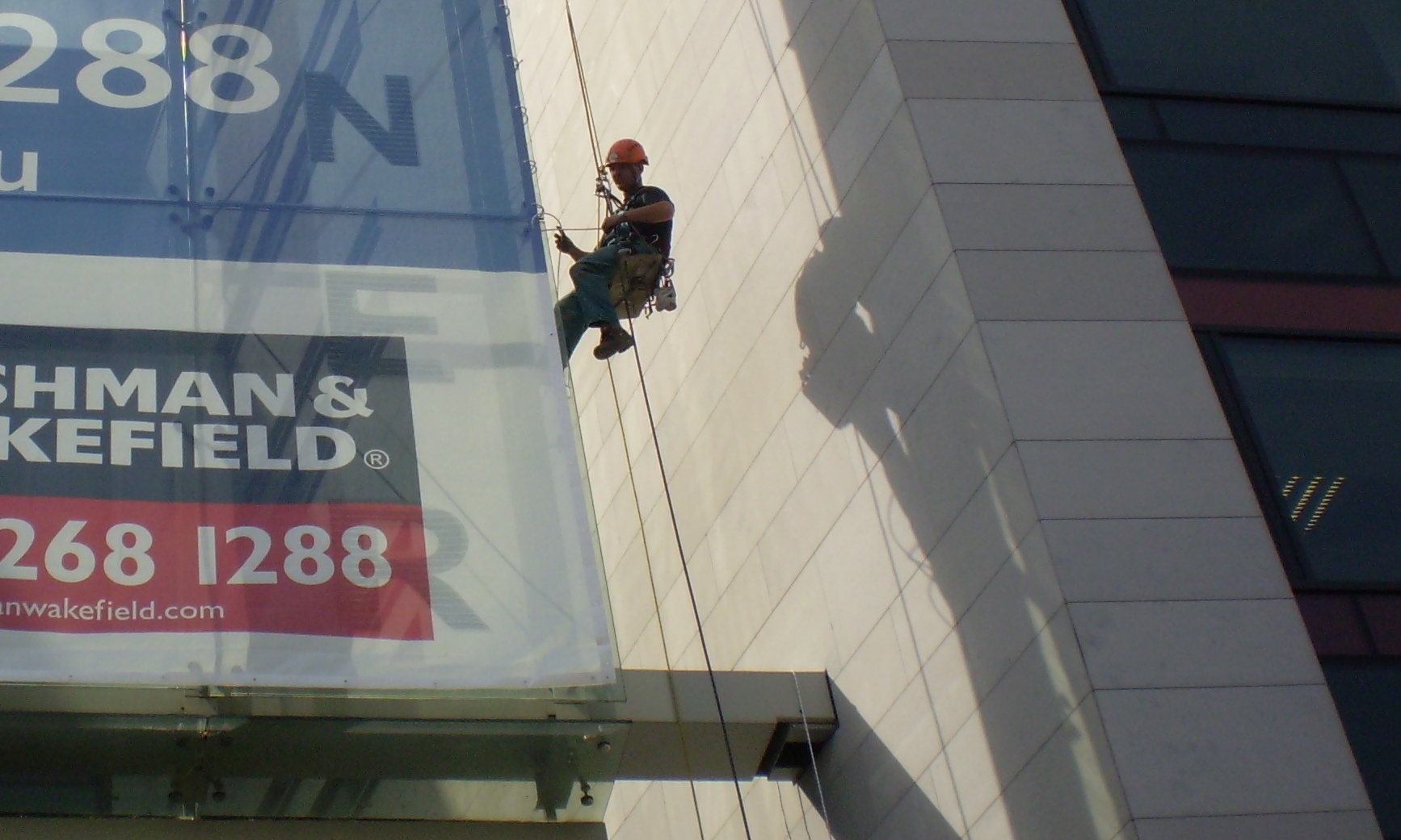 Rope access sign & banner installation - Repair Abseiling Ltd.