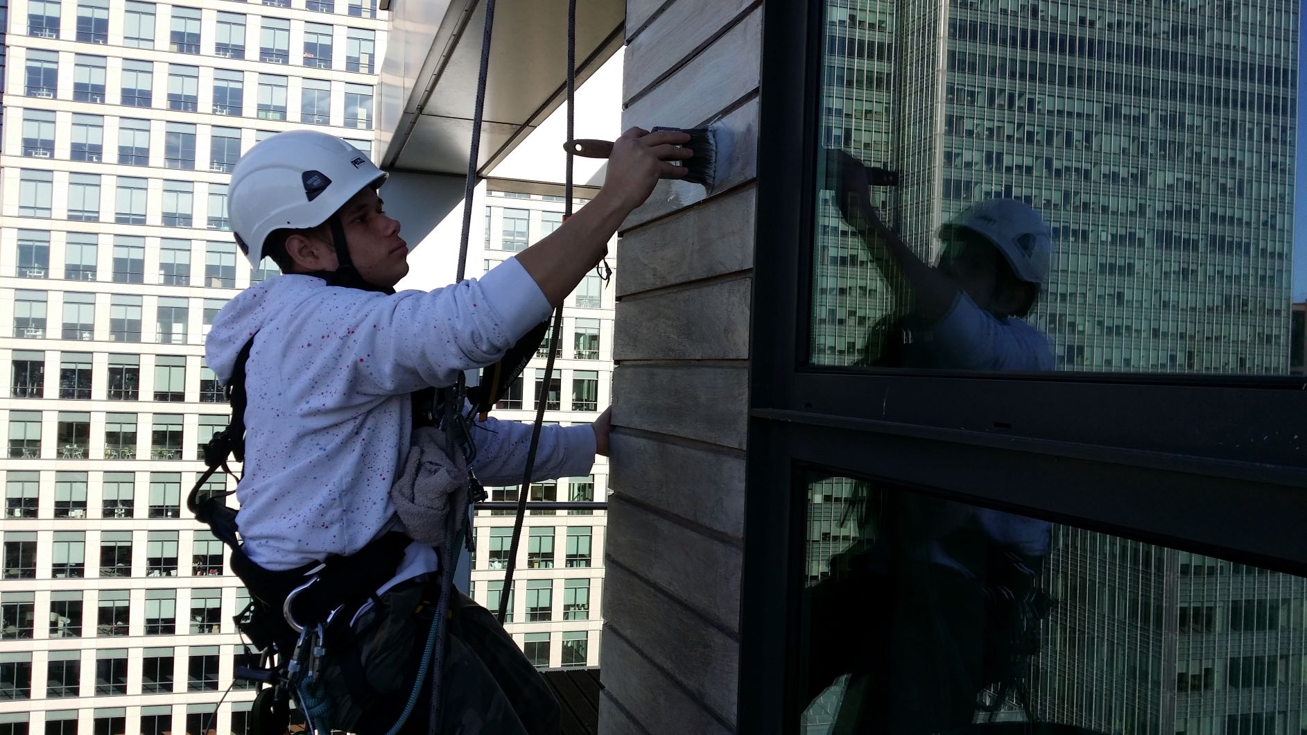 High rise building painting abseiling - Repair Abseiling Ltd.