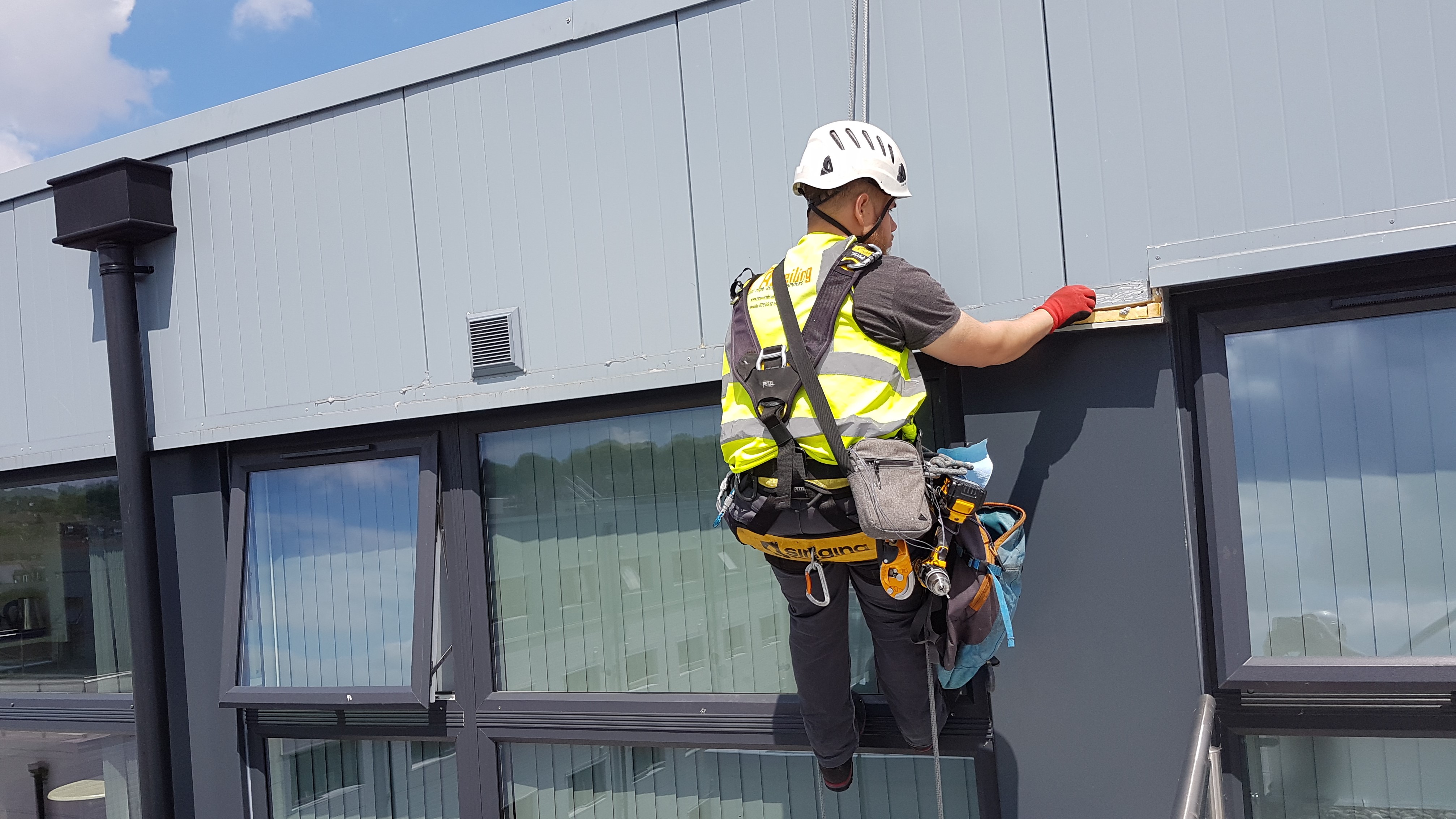 Rope access cladding repair - Repair Abseiling Ltd.