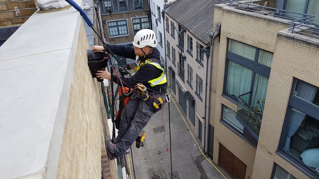 Rope access down pipe installation - Repair Abseiling Ltd.