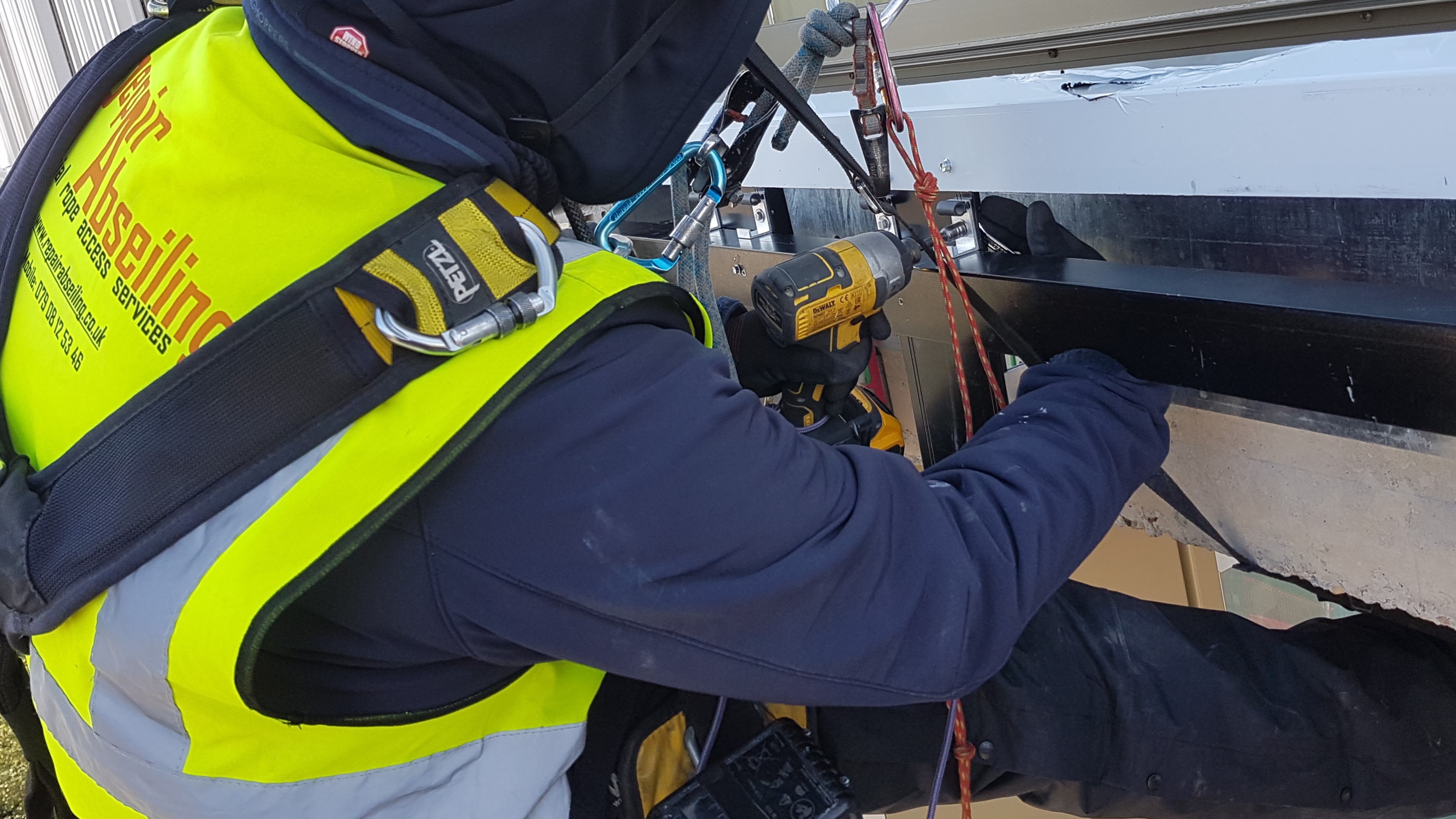 Rope access cladding installation - Repair Abseiling Ltd.