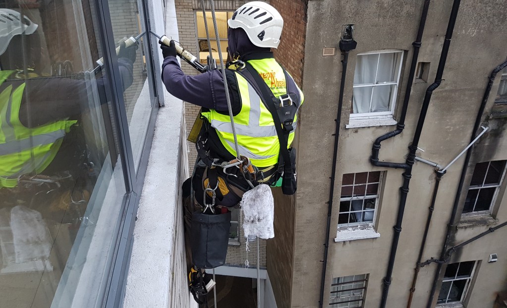 Rope access mastic application - Repair Abseiling Ltd.